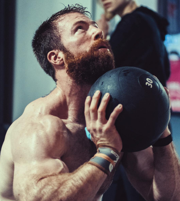 4 Quick Tips to Go Harder During Intense WODs | BarBend