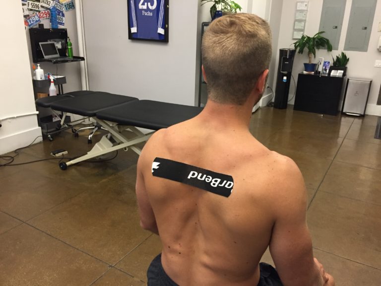 Kinesiology Taping for Posture | BarBend