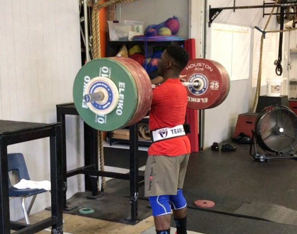 Watch CJ Cummings Front Squat 200kg for 5 Reps! | BarBend