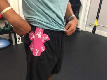 Kinesiology Taping for Hip Pain | BarBend