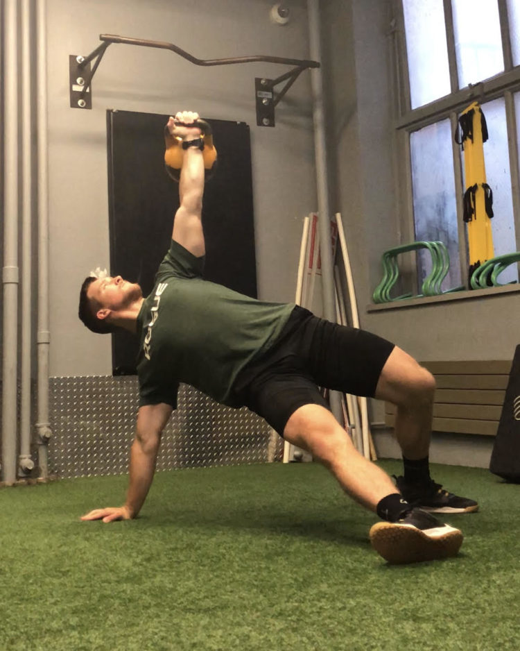 Turkish Get Up Exercise Guide | BarBend