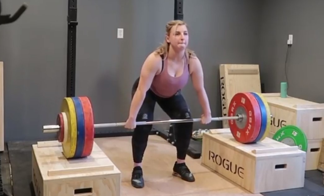 Watch Weightlifter Katherine Nye Clean 150kg/330lb Off Blocks | BarBend