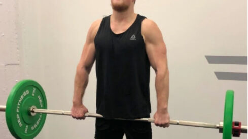 Build Big Traps and Strengthen Your Lifts With Shrugs | BarBend