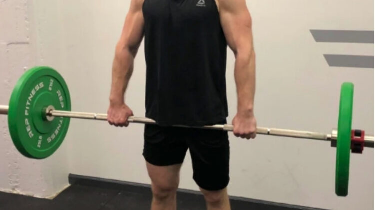 Build Big Traps and Strengthen Your Lifts With Shrugs | BarBend