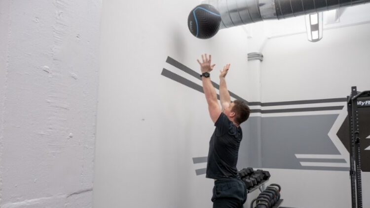 The Wall Ball is the Cardio Booster Your Workouts Are Missing | BarBend