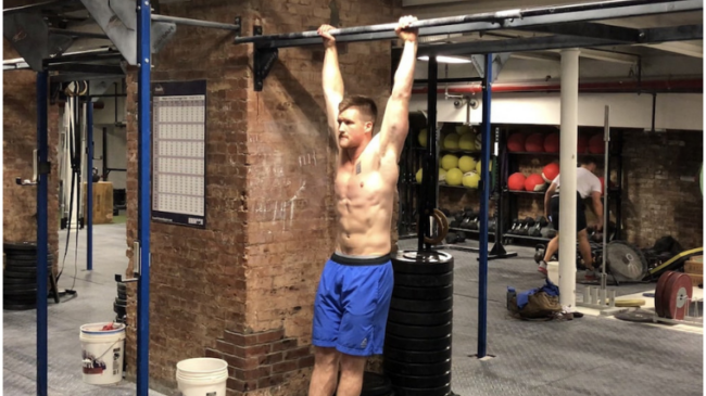 Lift Up Your Ab Workouts with the Hanging Knee Raise | BarBend