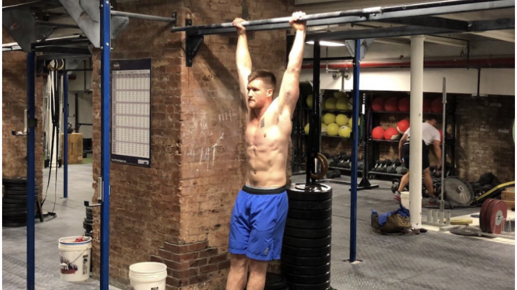 Lift Up Your Ab Workouts with the Hanging Knee Raise | BarBend