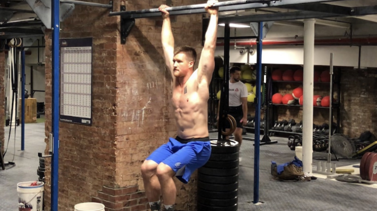 Lift Up Your Ab Workouts with the Hanging Knee Raise | BarBend