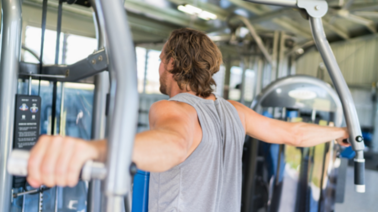 How to Do the Reverse Pec Deck — Tips, Tricks, & Variations | BarBend