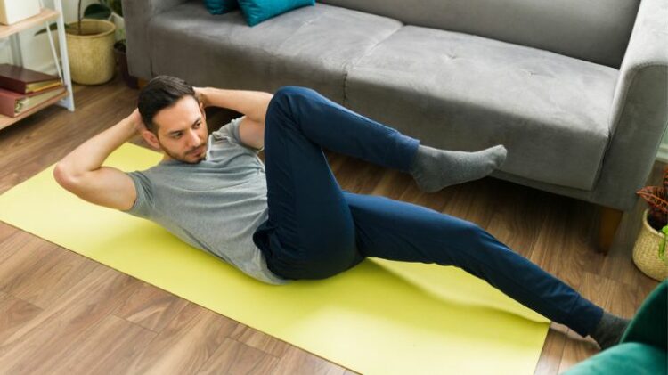 How to Do the Bicycle Crunch for Conditioning and Carved Abs | BarBend