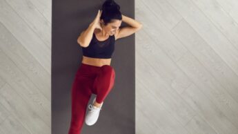 How to Do the Bicycle Crunch for Conditioning and Carved Abs | BarBend