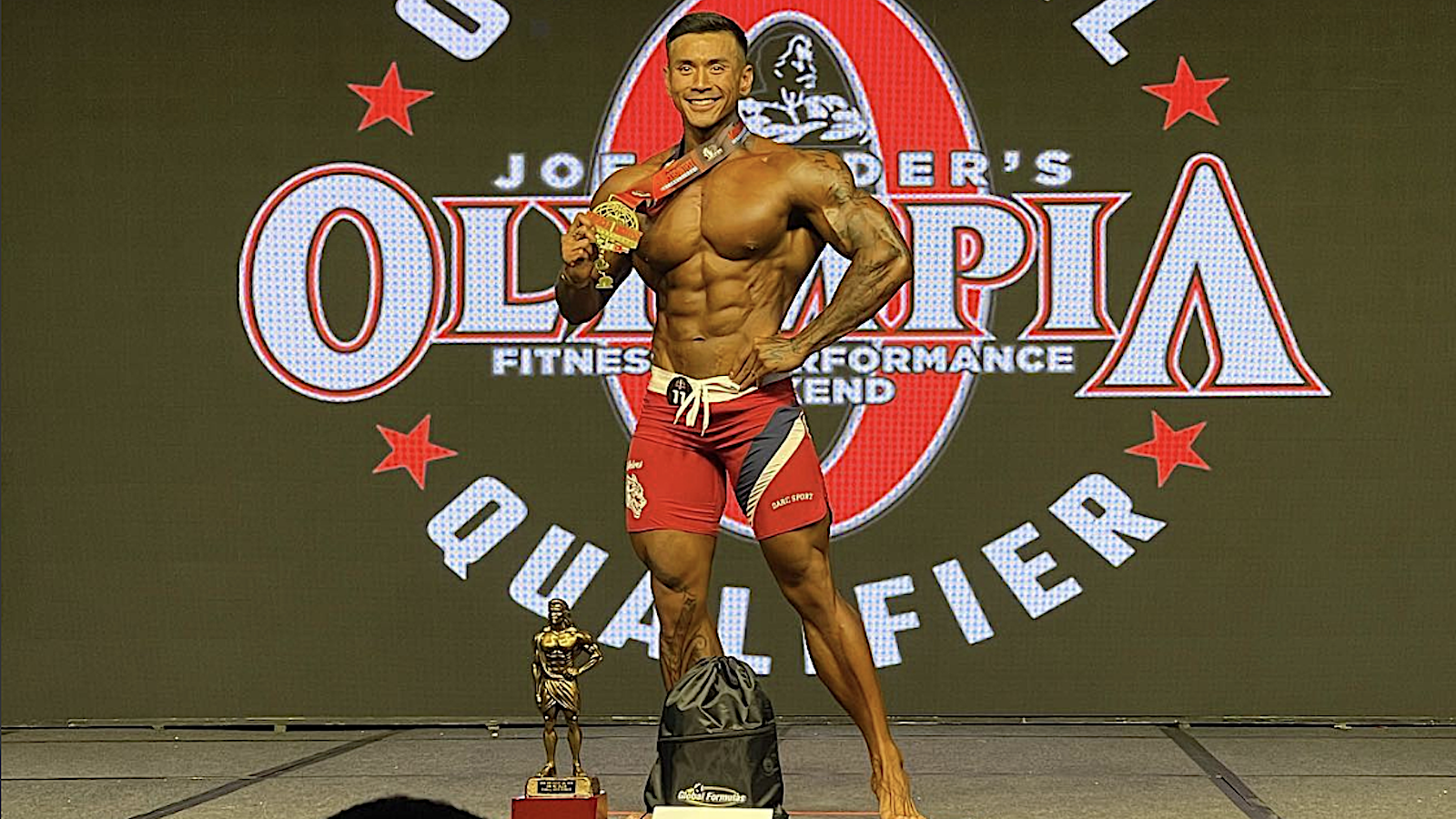 Jonas Jamena Triumphant at 2023 Pacific USA Men’s Physique Show | BarBend