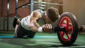 The Best Ab Wheel Workouts You Can Do at Any Experience Level | BarBend