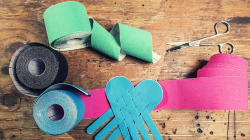 How Does Kinesiology Tape Work? + How to Use It Properly | BarBend